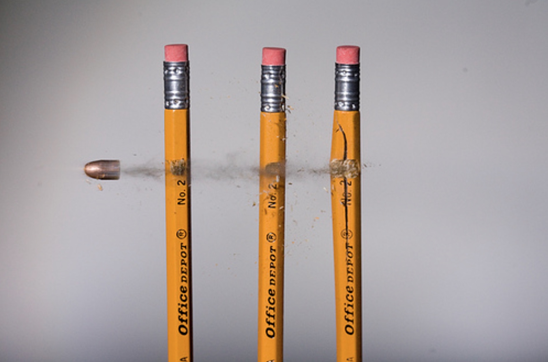23 Freeze Frame Photos of Bullets Going Through Things | eBaum's World